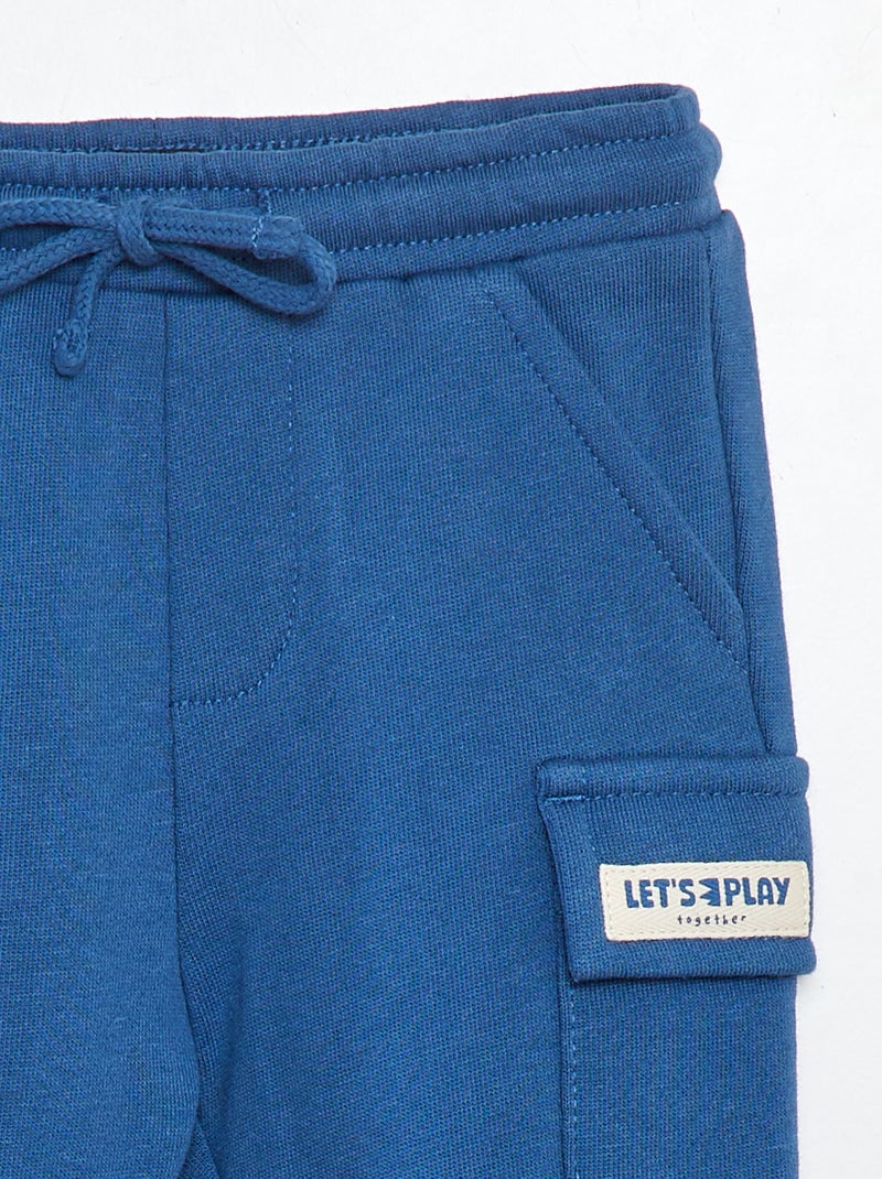 Jogging uni avec poches à rabat - BLEU - Kiabi - 4.00€