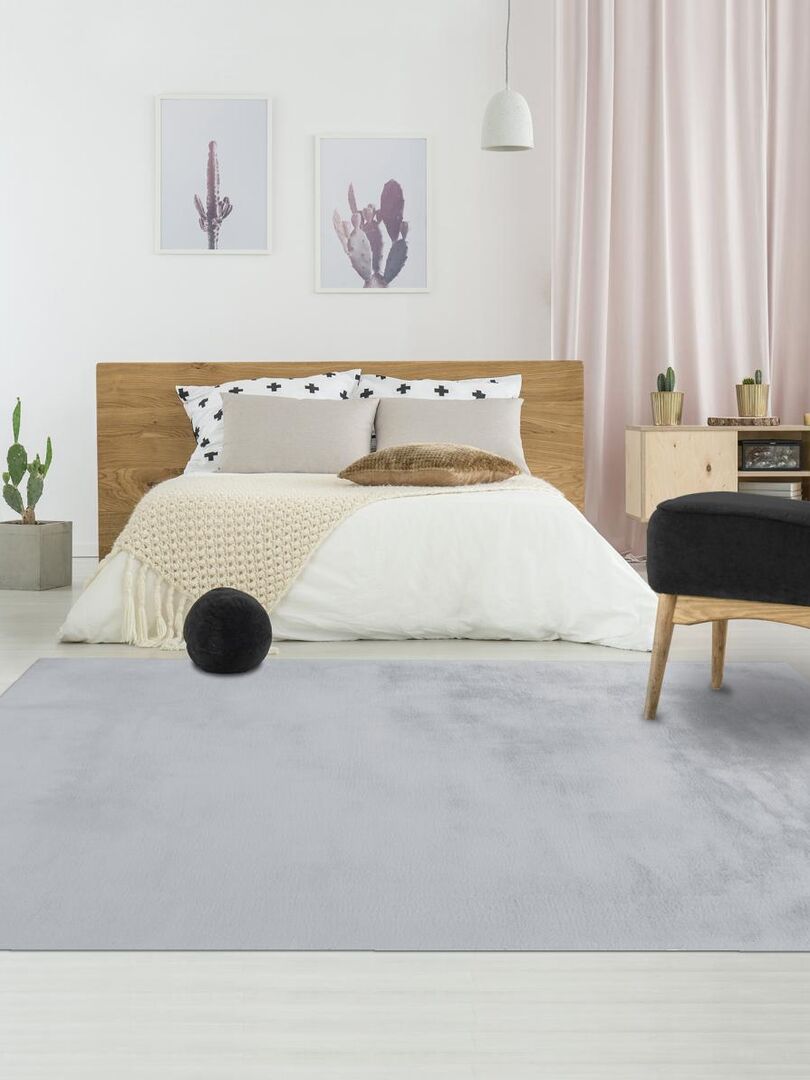 Tapis longs poils shaggy fait à la main motif uni CAREI + - Bleu - Kiabi - 164.11€