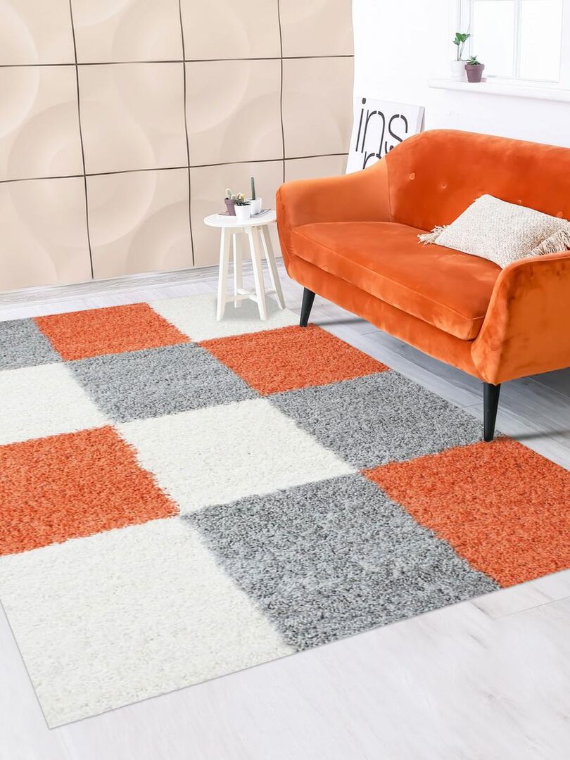 Tapis poils longs shaggy tissé motif damier CARRÉ A - Orange - Kiabi - 54.99€